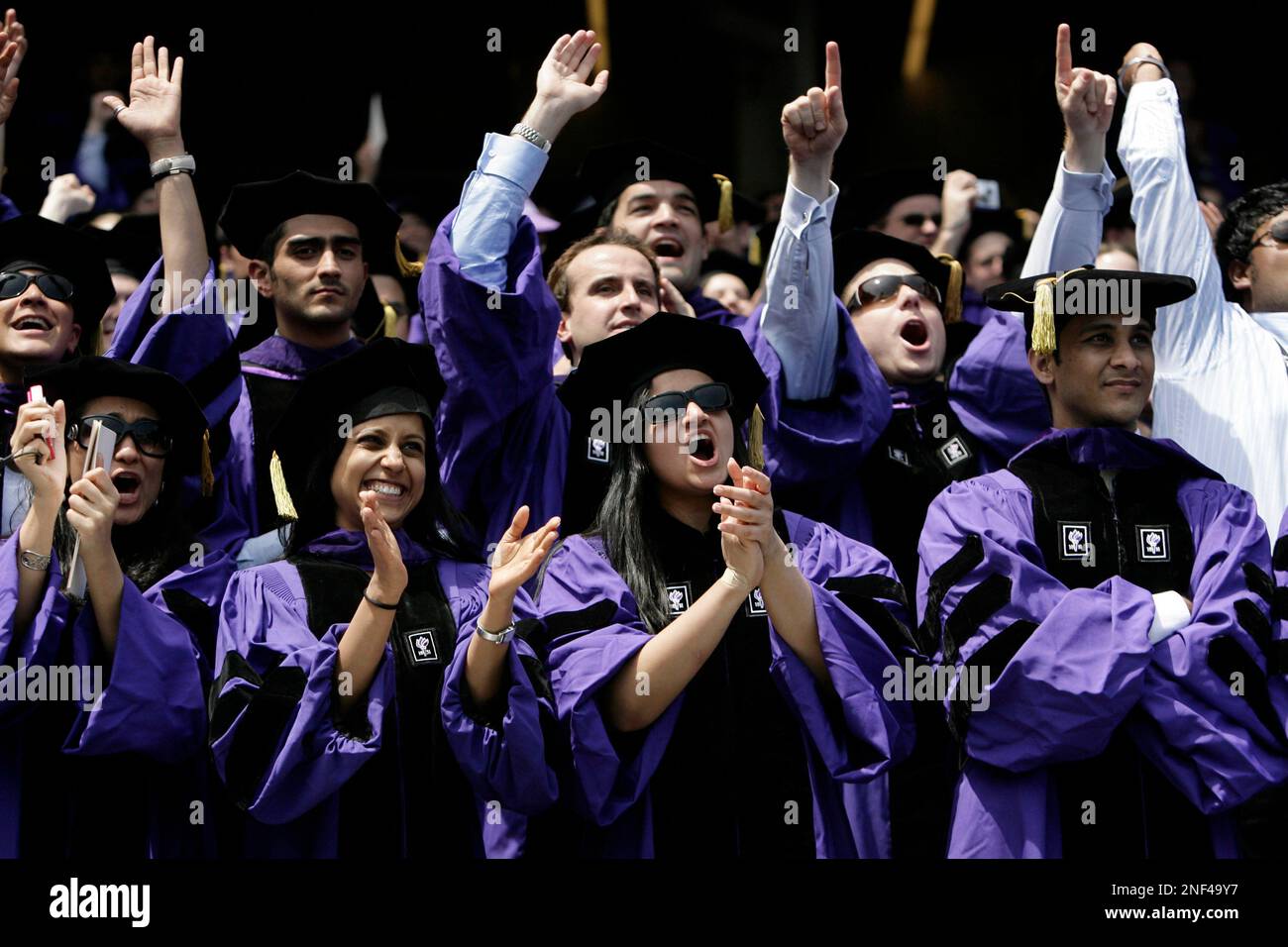 New graduates cheer during the New York University commencement ...