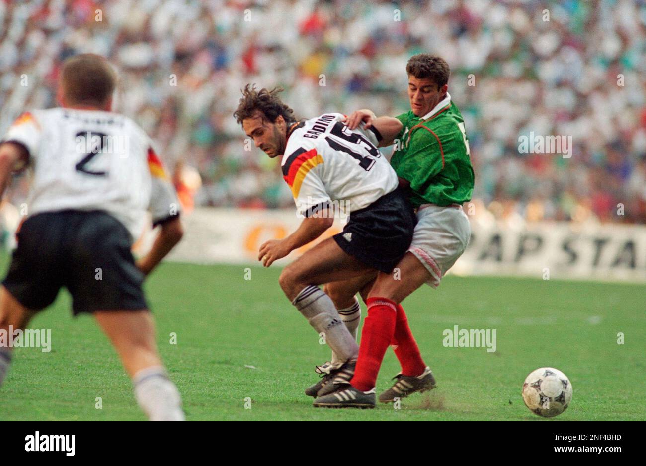 Germany's Maurizio Gaudino, left, and Mexico's Ramon Ramirez, battle ...