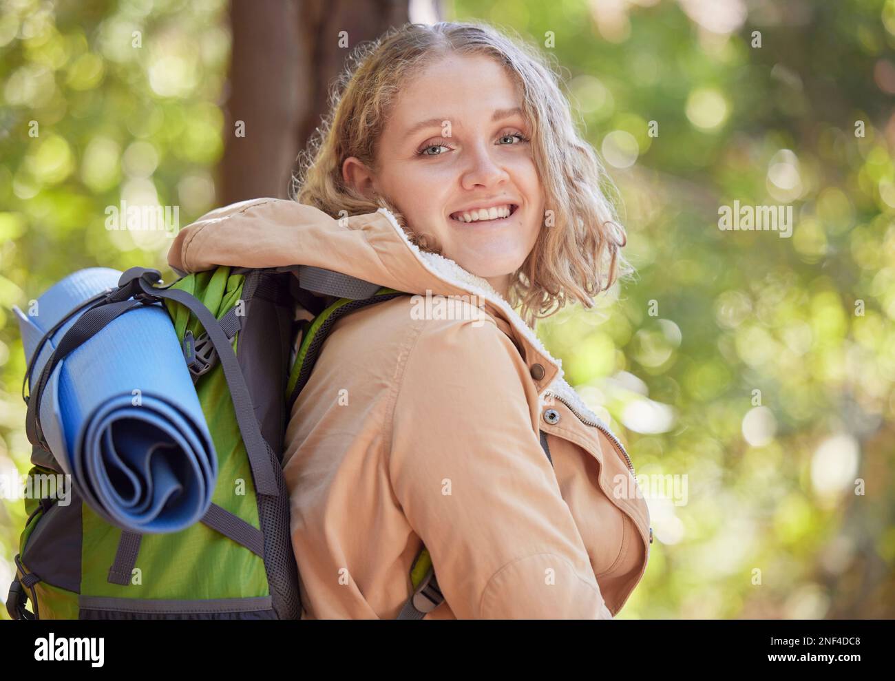 Woman, hiking portrait and forrest with smile for freedom, peace and ...
