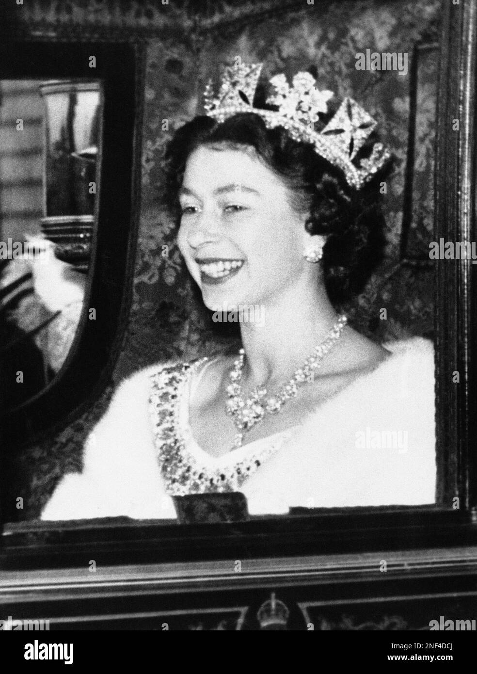 Queen Elizabeth II smiles as she rides in Irish State coach from London ...