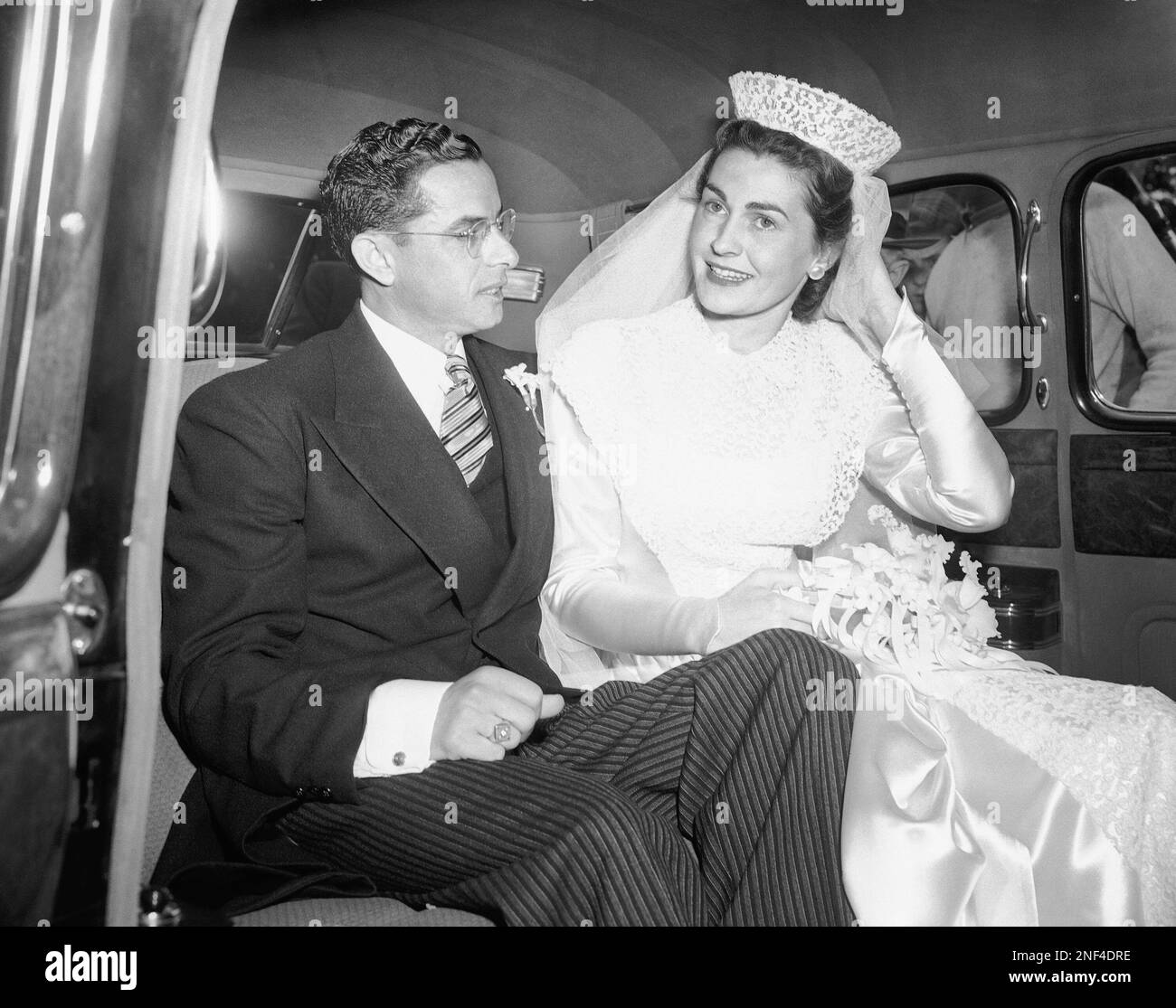 Dom DiMaggio, center fielder for the Boston Red Sox, and his bride, the ...