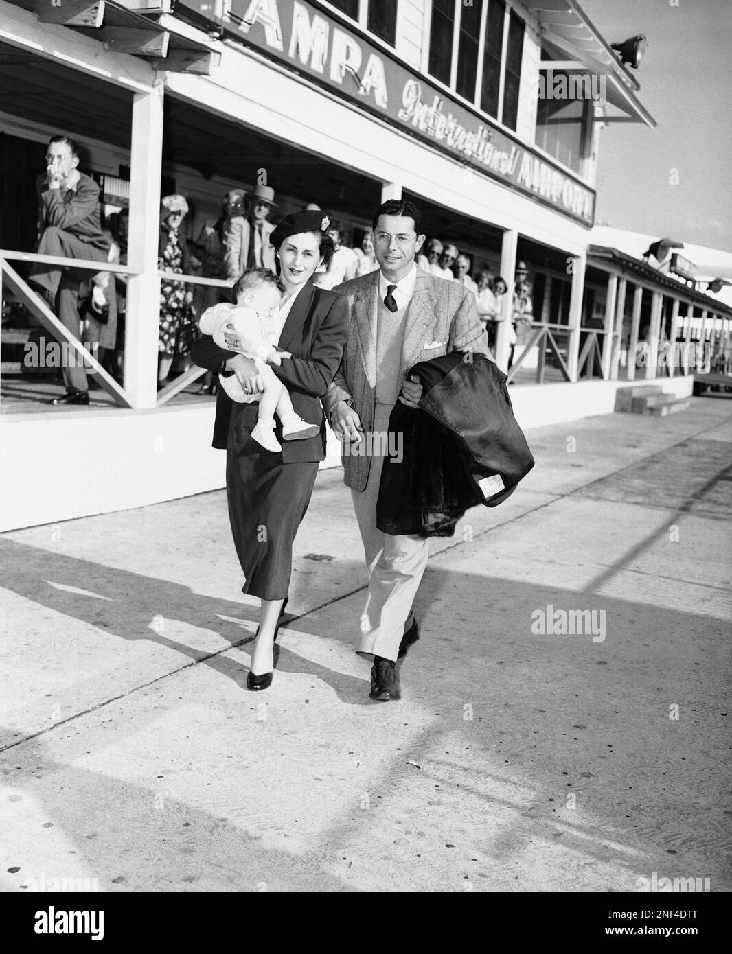 Dom DiMaggio of Boston Red Sox and his wife Emily arrive at Tampa, Fla ...