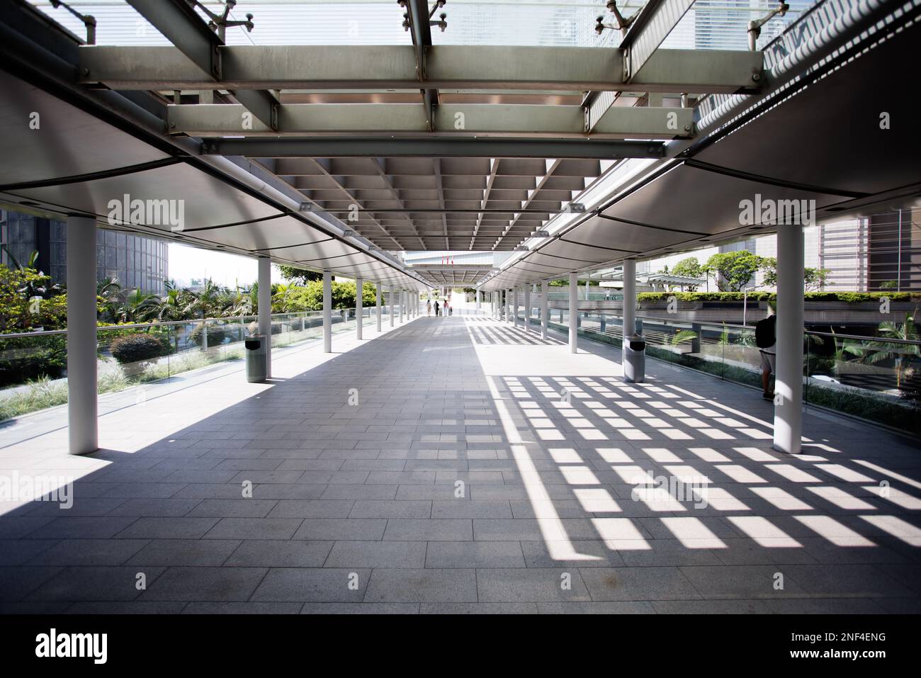 A perspective along the walkway towards the Four Seasons hotel in ...