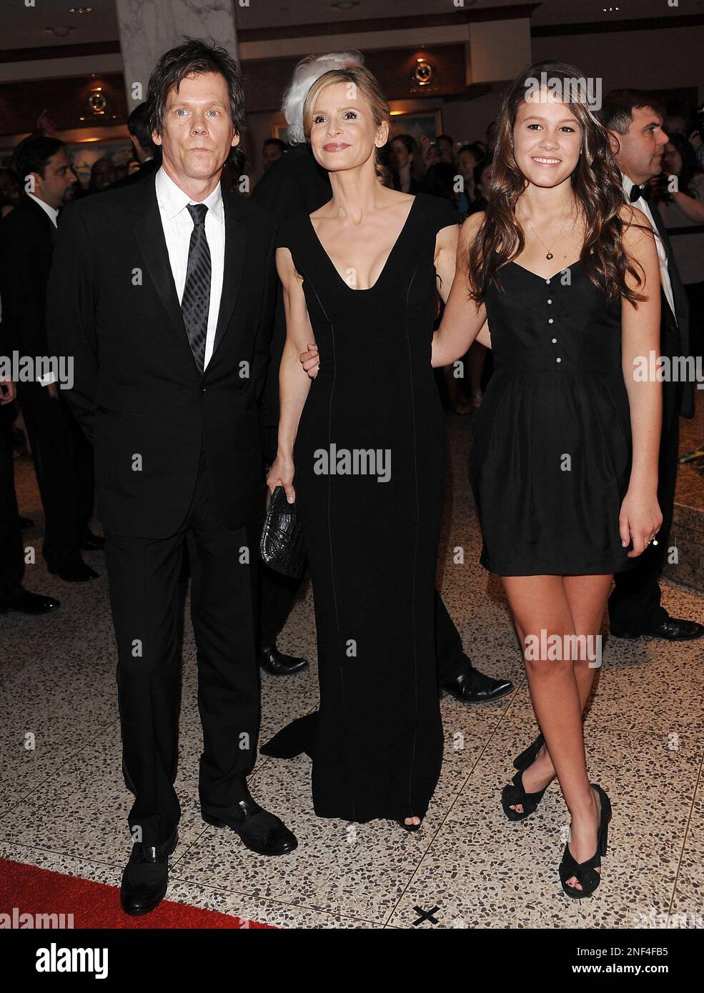 Actors Kevin Bacon and Kyra Sedgwick, center, pose with their daughter ...
