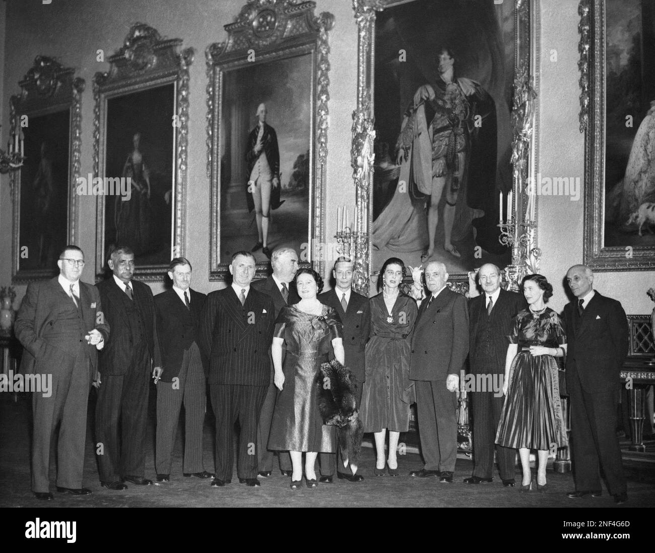 King George VI (seventh from left), and Queen Elizabeth (sixth from ...