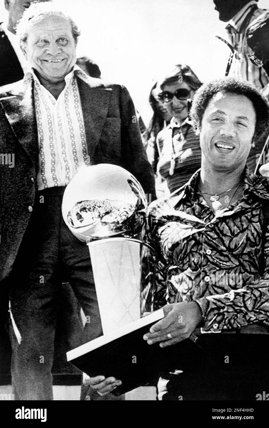 Seattle Super Sonics Coach Lenny Wilkens carries the NBA Championship ...