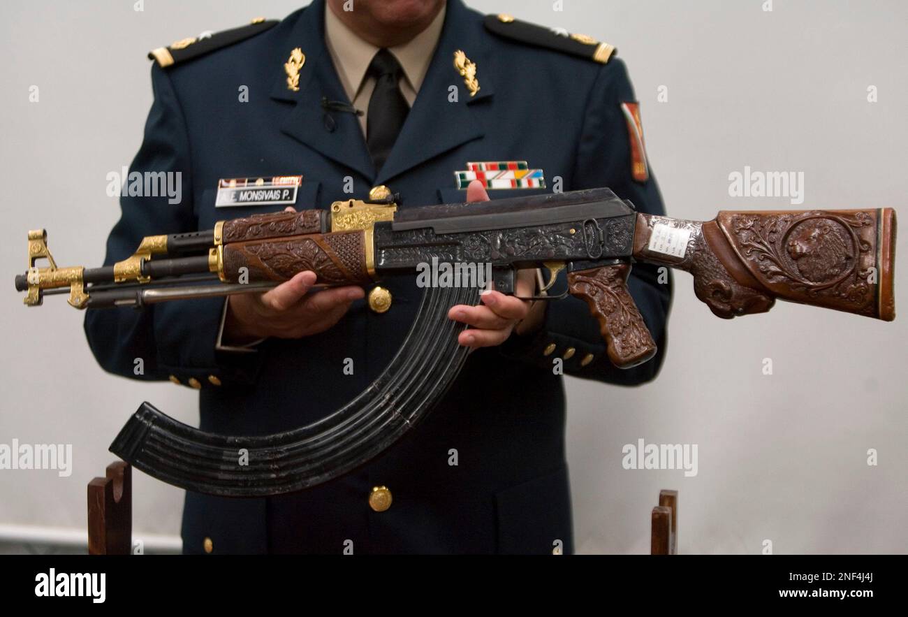 In this April 24, 2009 photo, Gen. Antonio Erasto Monsivais holds up a ...