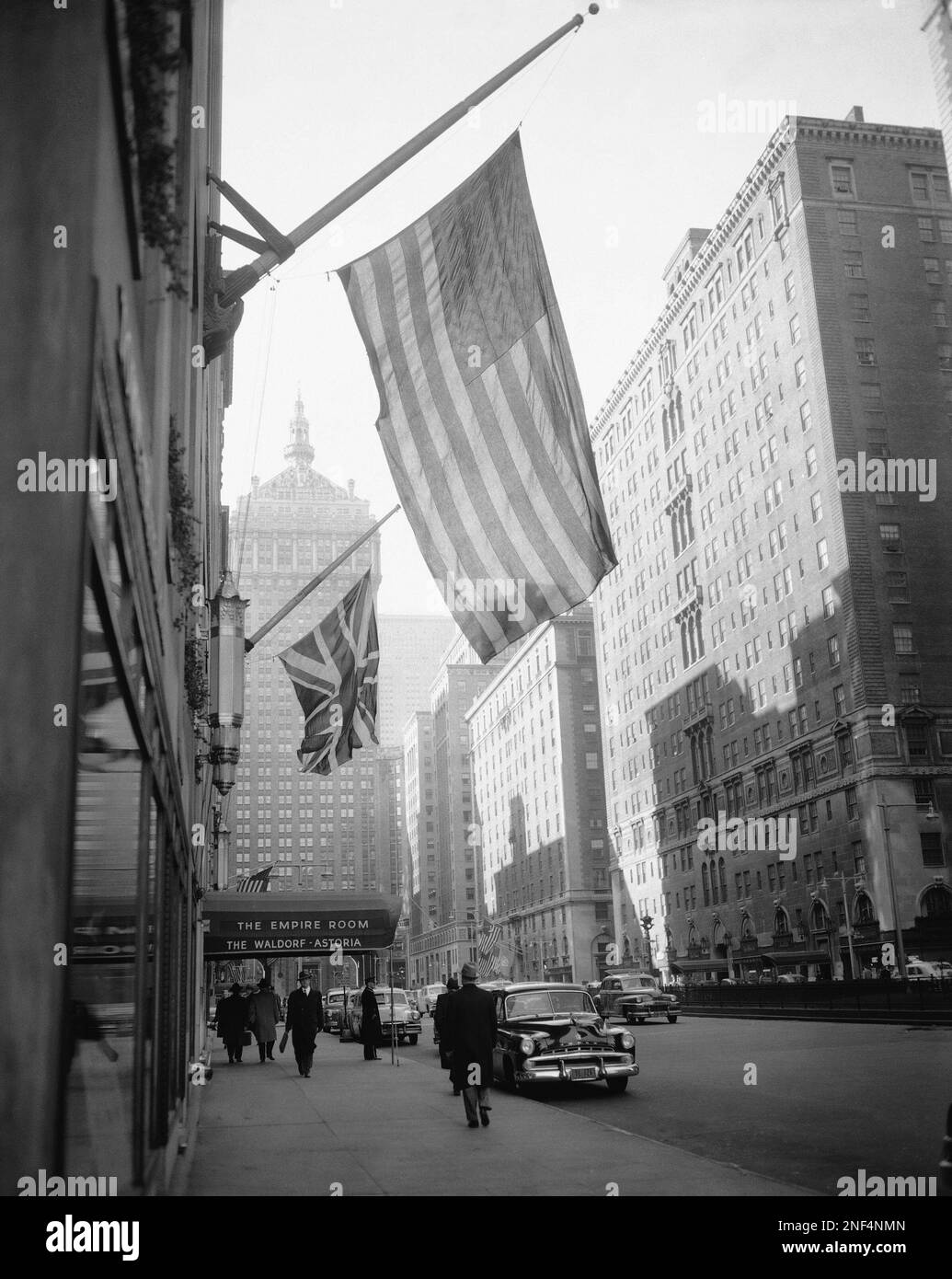 An English and an American flag both fly at half staff from the Park ...