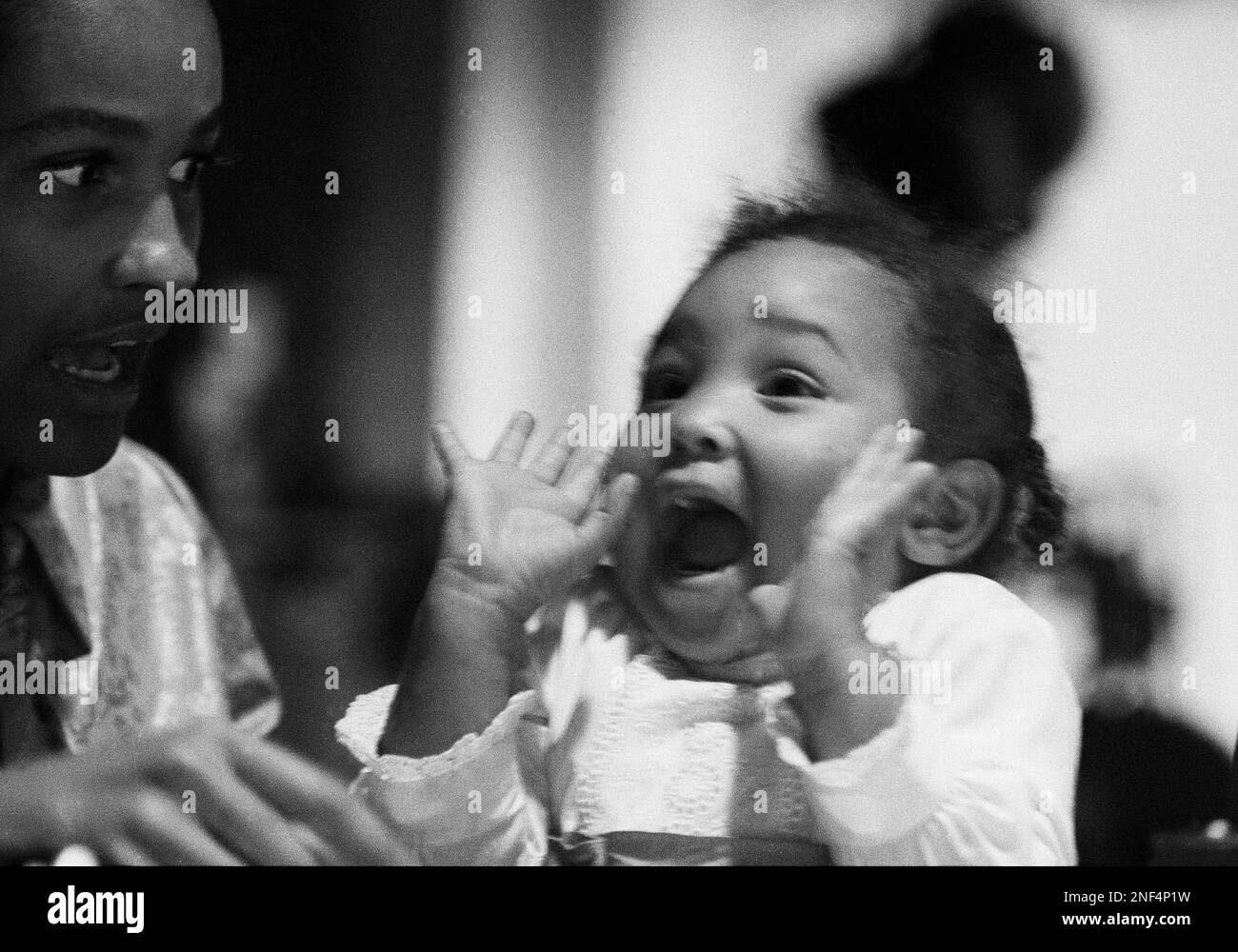 Maryum Ali, two-year-old daughter of Muhammad Ali, laughs backstage as ...