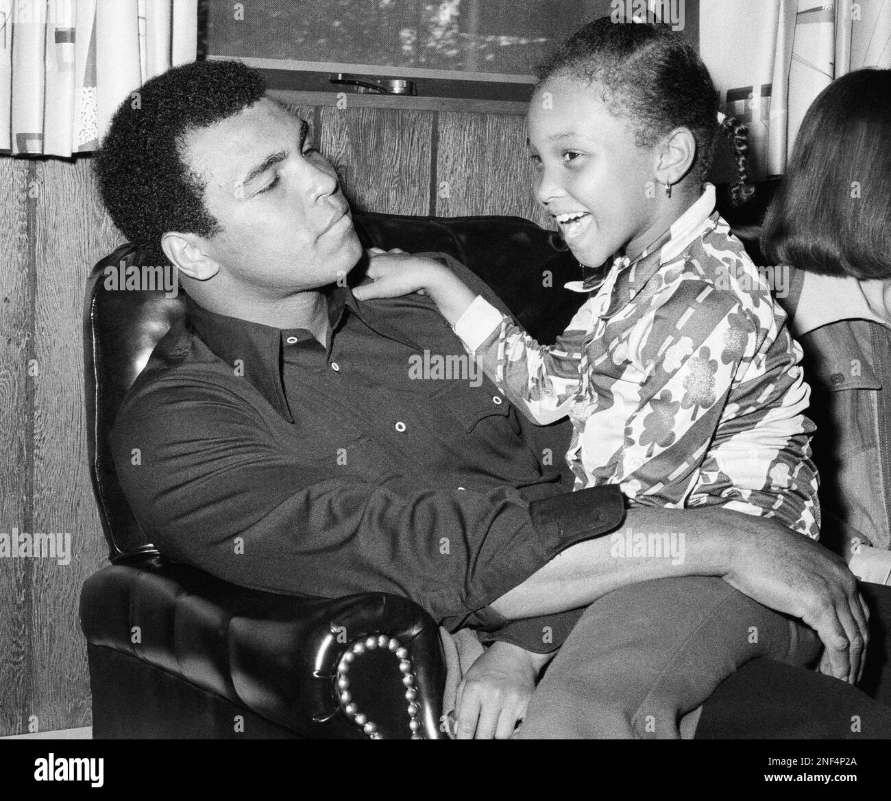 Muhammad Ali cuddles up to his seven-year-old daughter Maryum Ali at ...