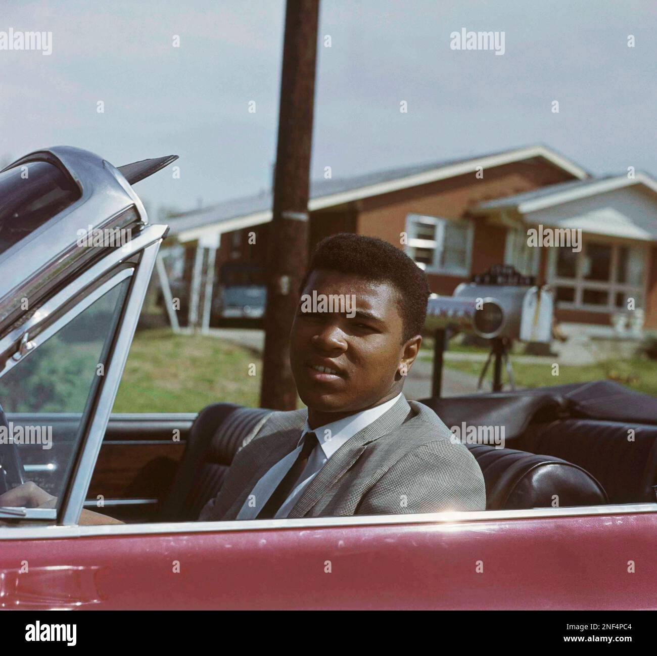 Muhammad Ali at wheel of car on April 2, 1963. (AP Photo Stock Photo ...