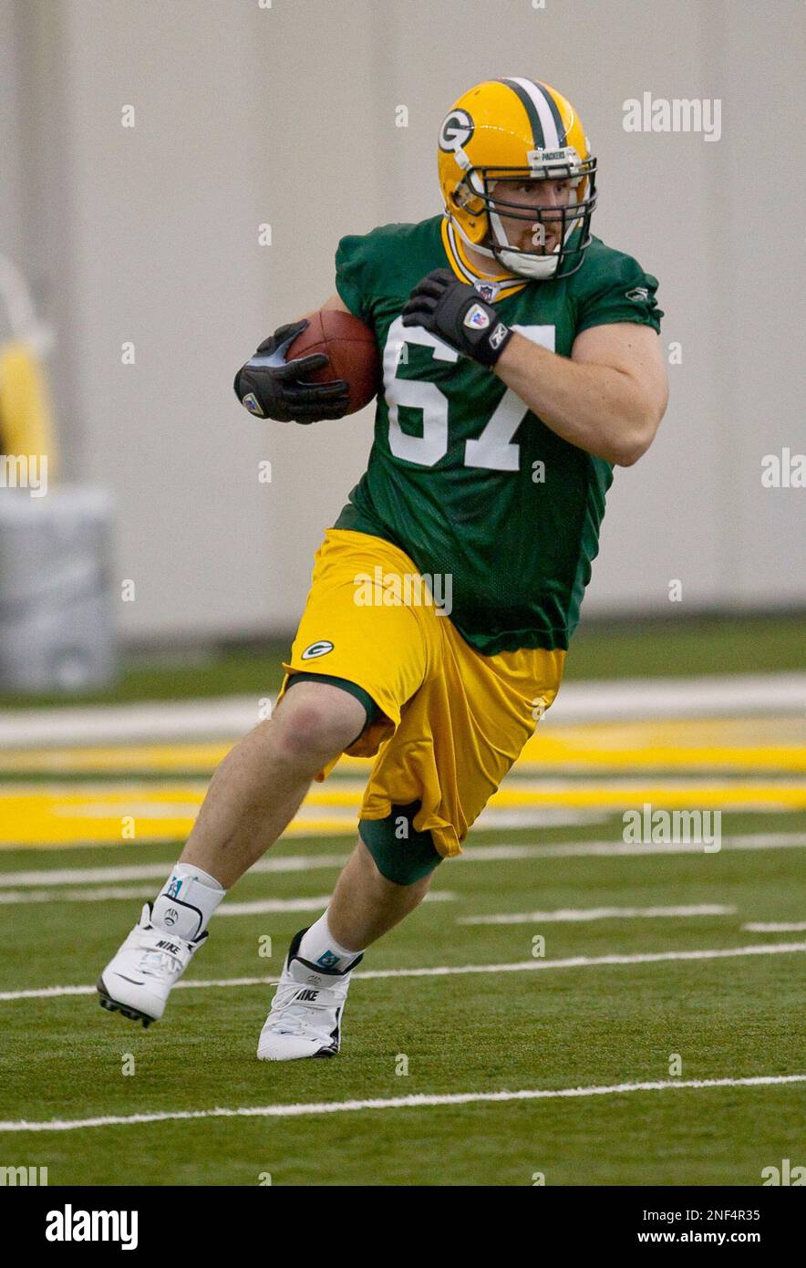 Green Bay Packers Tyler Booth participates during an NFL football drill ...