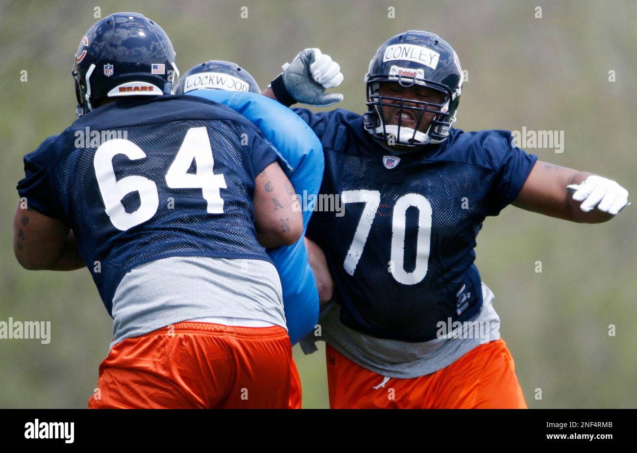 Chicago Bears' Dennis Conley (70) works with Lou Saucedo (64) and Aaron ...