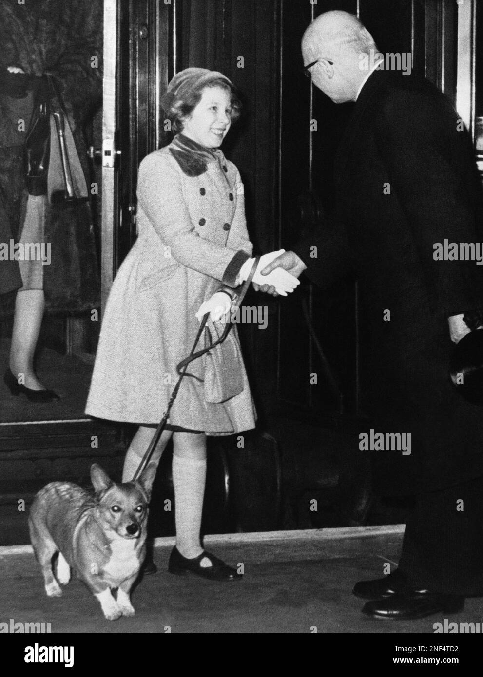 Princess Anne shakes hands with station master at Liverpool train ...