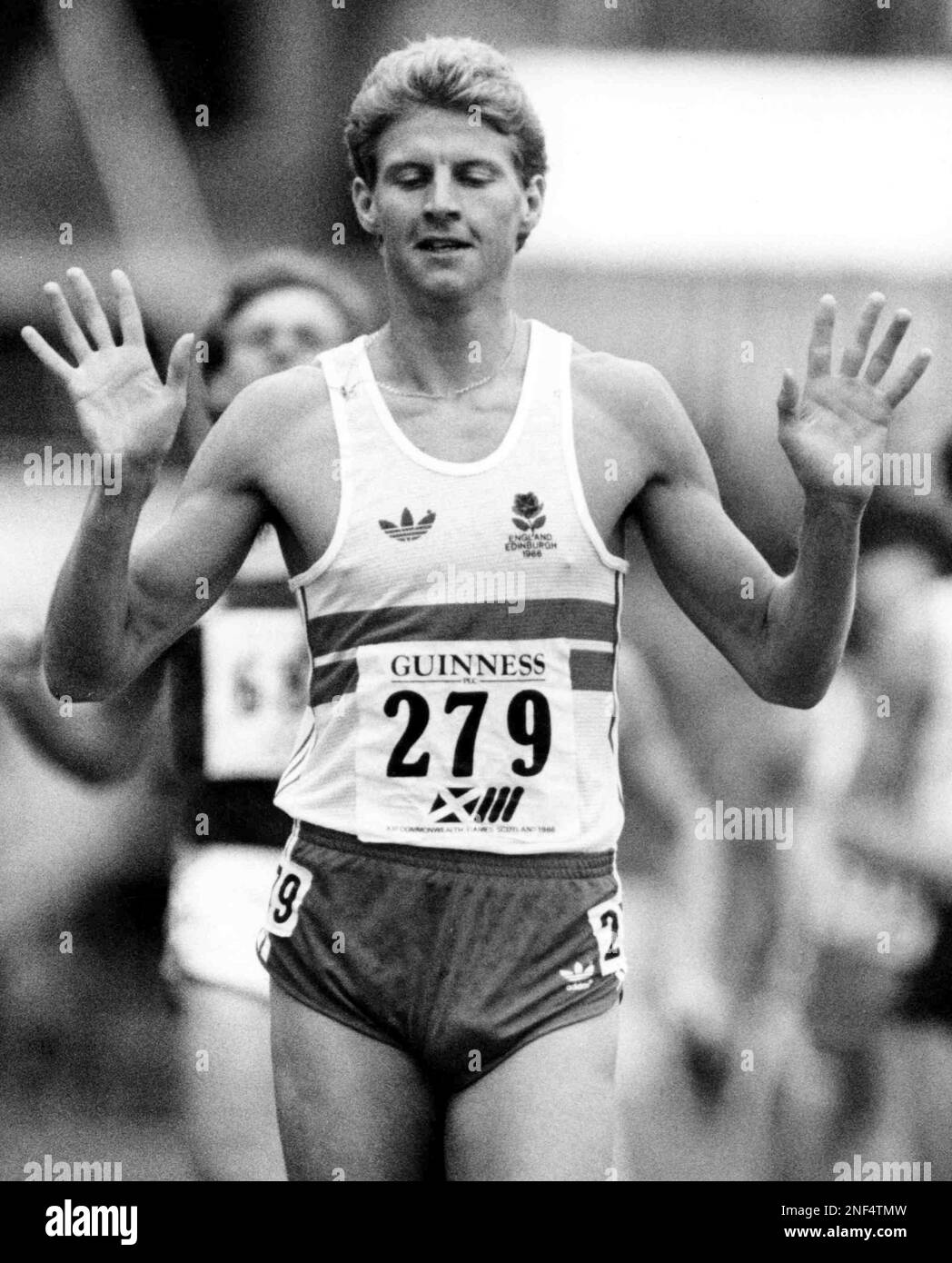 England's Steve Cram raises his arms as he crosses the finish line at ...