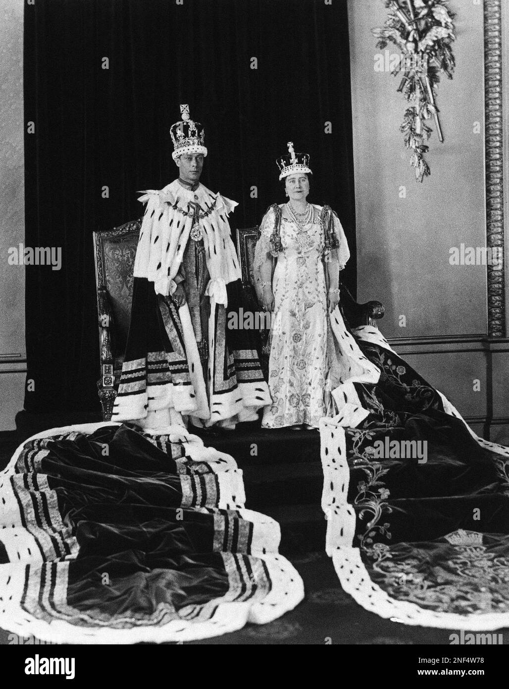 This official photograph shows King George VI and Queen Elizabeth ...