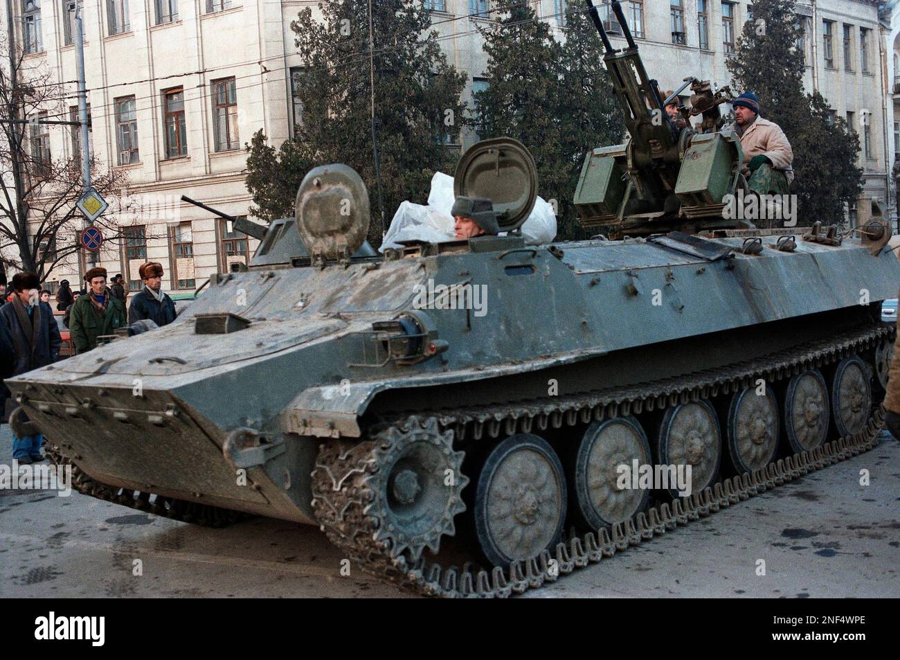 Chechen armored personnel carrier mounted with an anti-aircraft gun is ...