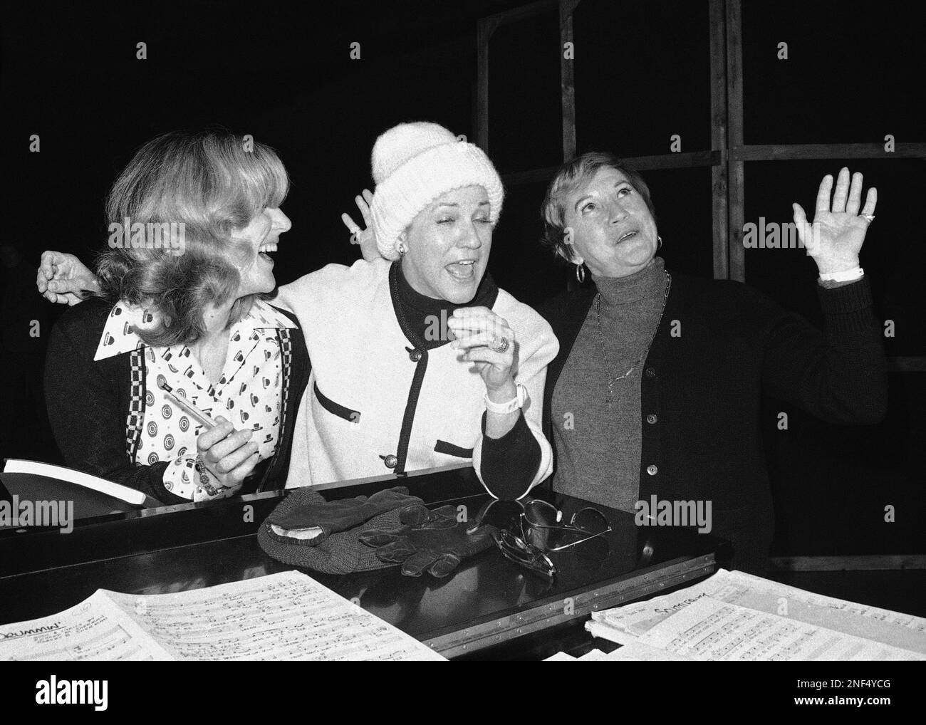 Two of the famous Andrews Sisters, Patty, center, and Maxene, right ...