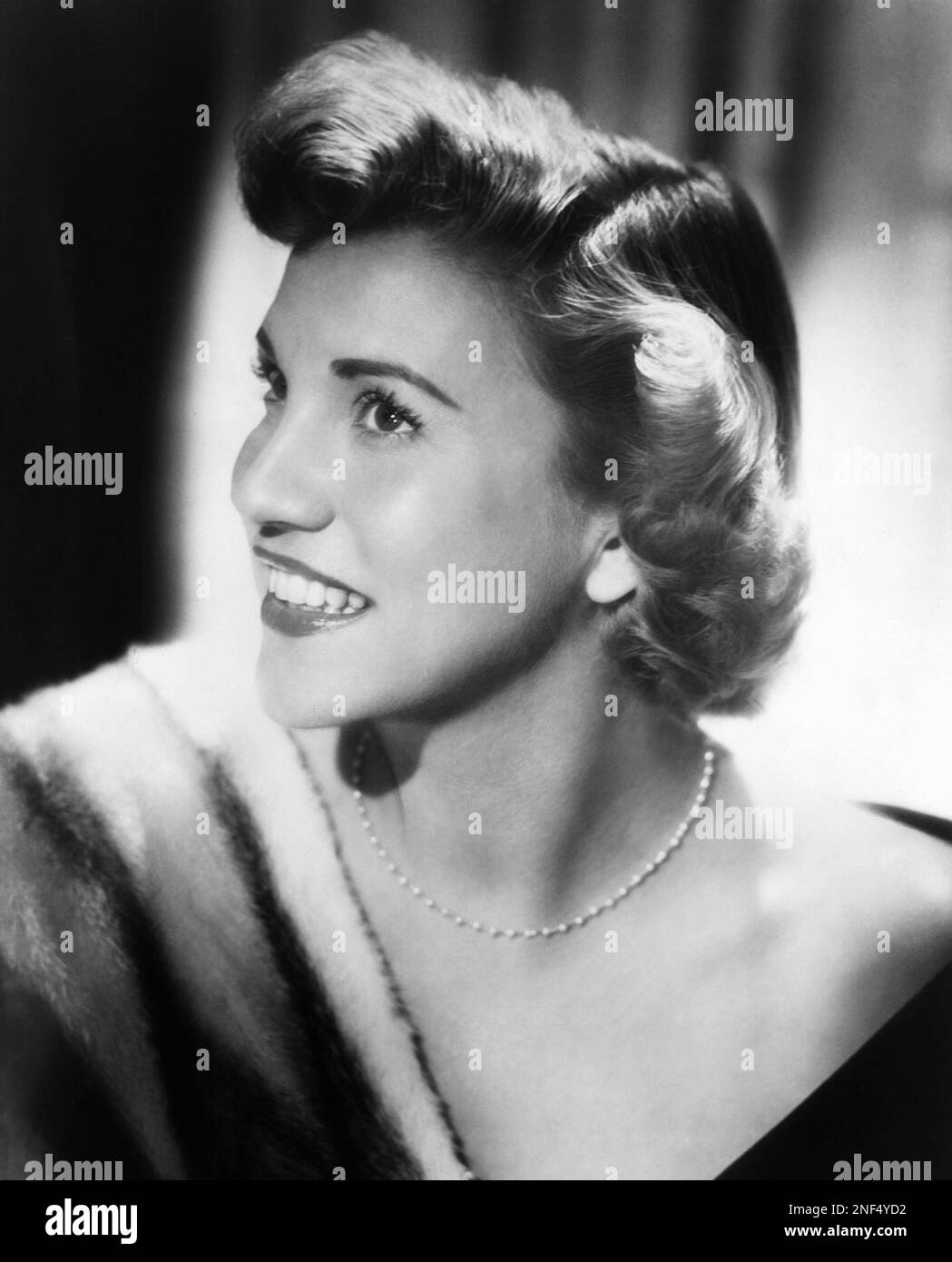 Patty Andrews, of the famous singing trio, the Andrews Sisters, is ...