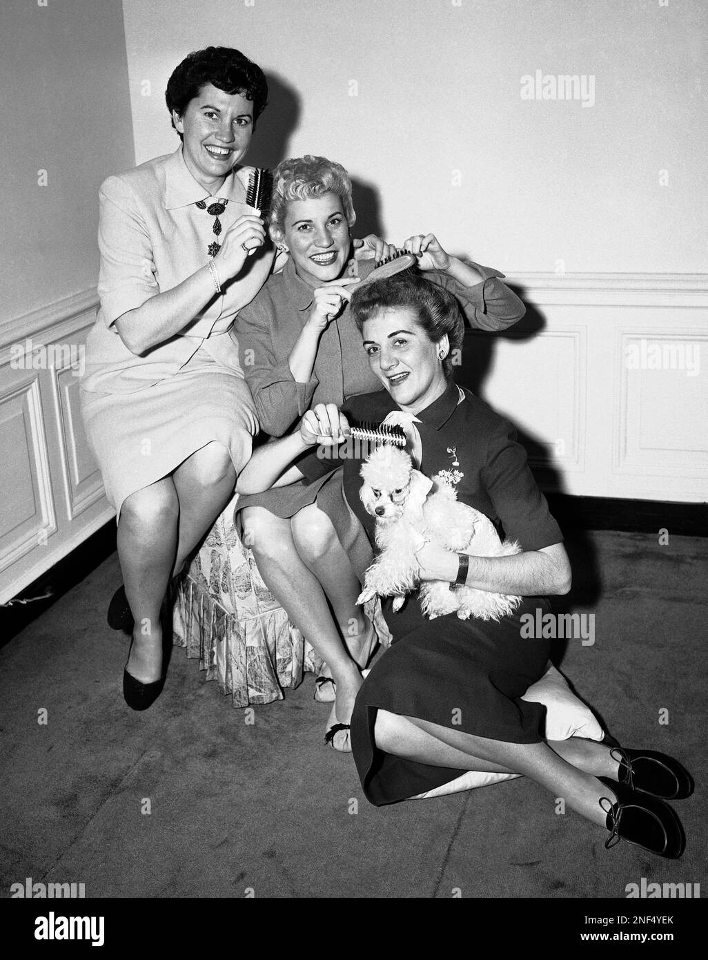 The Andrews Sisters, Maxene, Patty, LaVerne and poodle Heidi, shown Nov ...