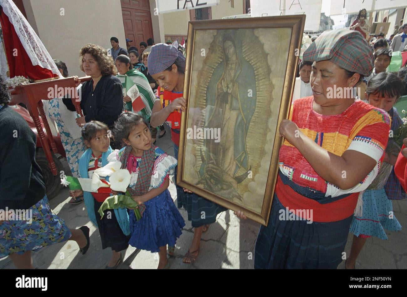 Indian women from the southeastern Mexican state of Chiapas carry an ...