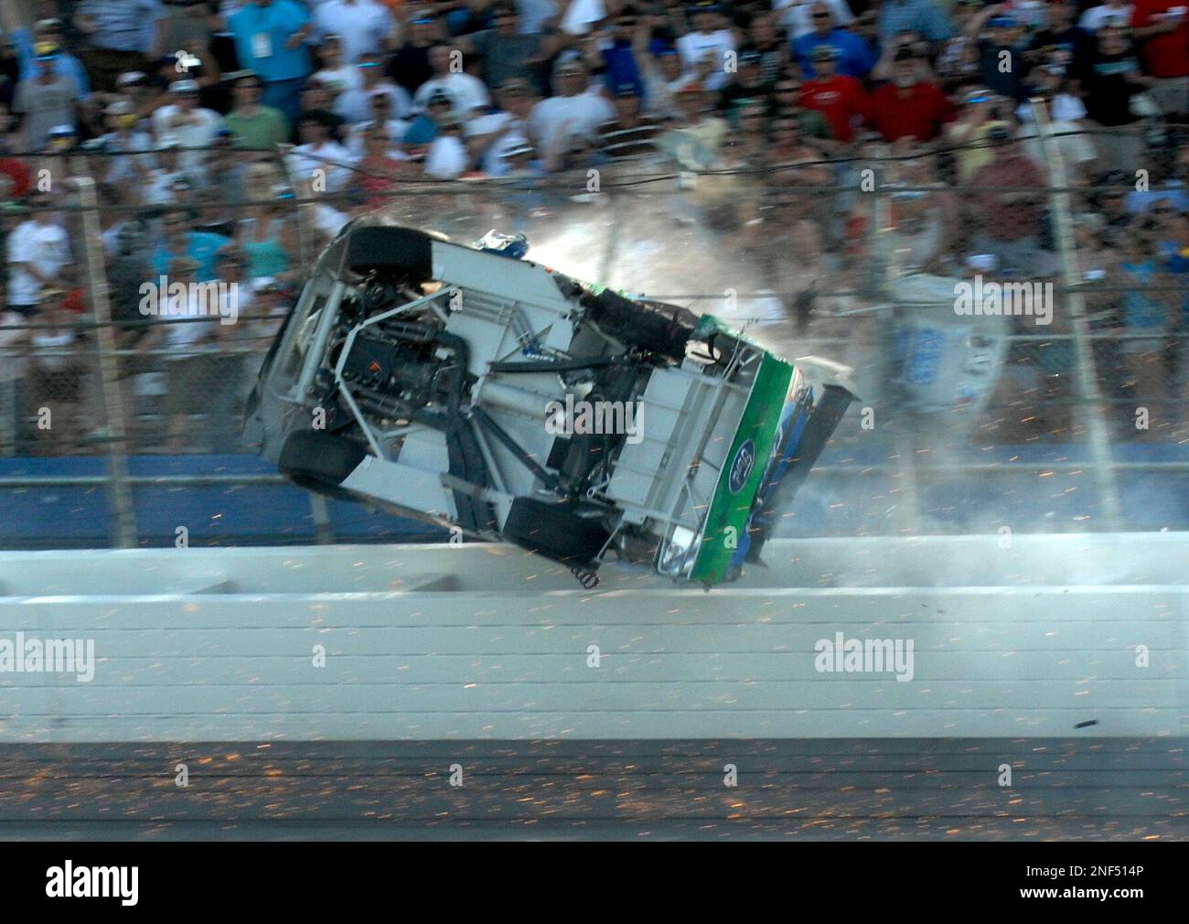 Carl Edwards hits the fence during a crash on the last lap of the Aaron ...