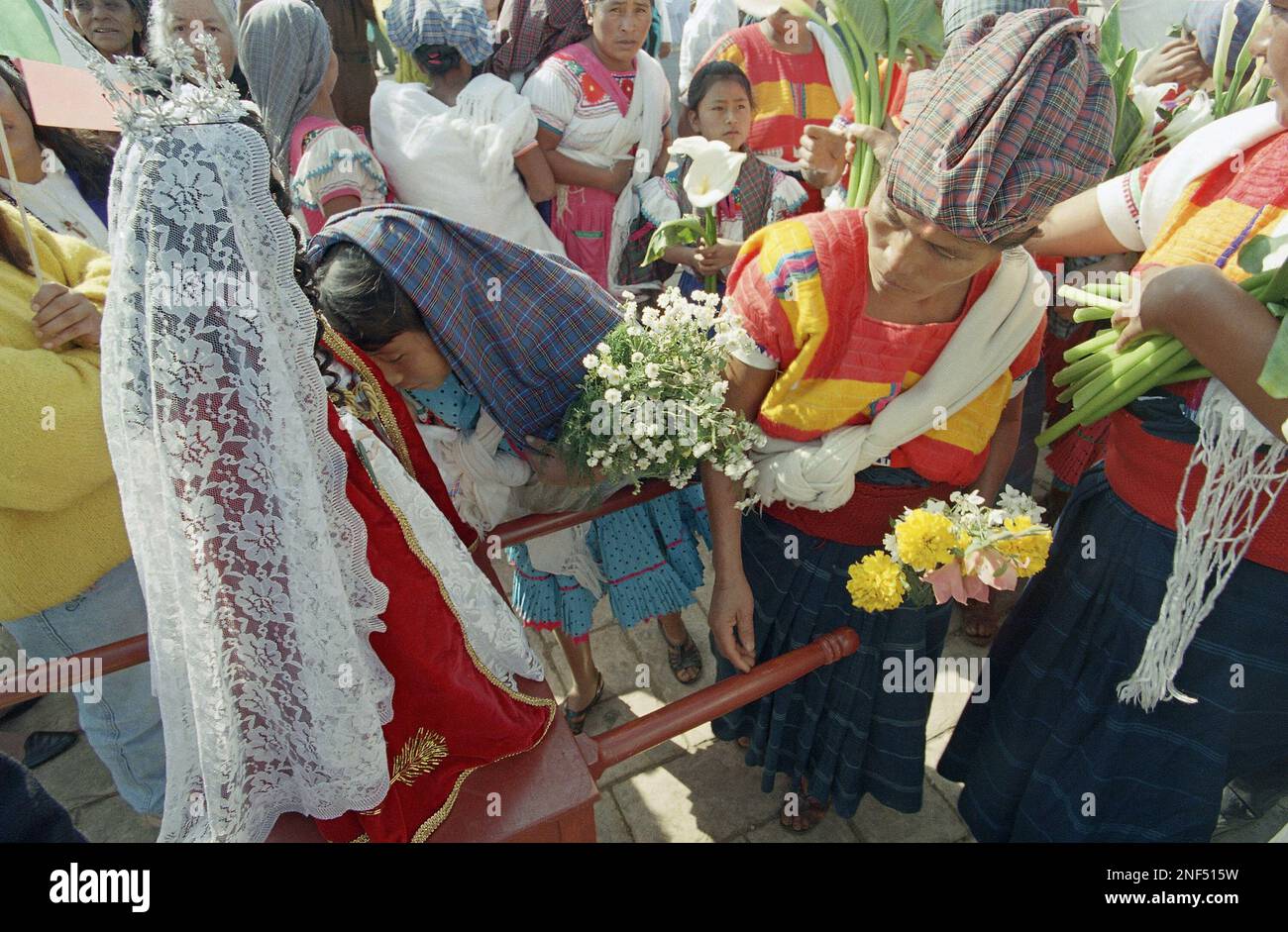 Indian women from the southeastern Mexican state of Chiapas kiss a ...