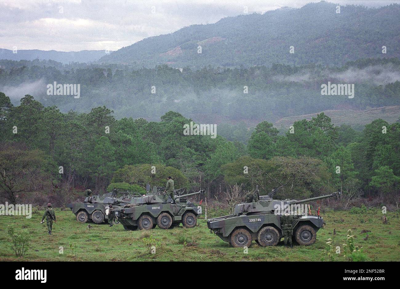 Mexican tanks guard a rural outpost near the village of Momon in rebel ...