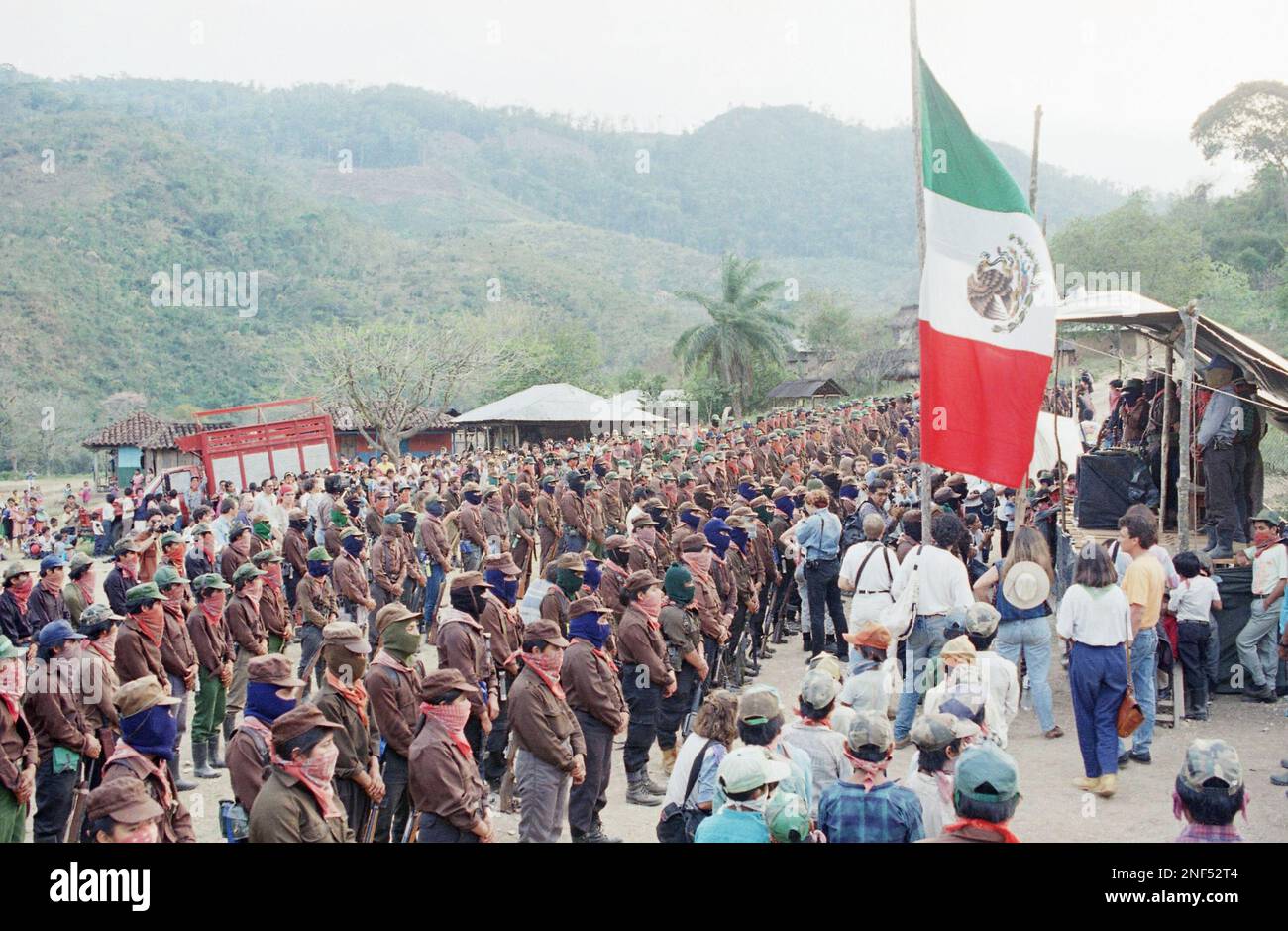 About 300 Zapatista Army for National Liberation (EZLN) soldiers stand ...