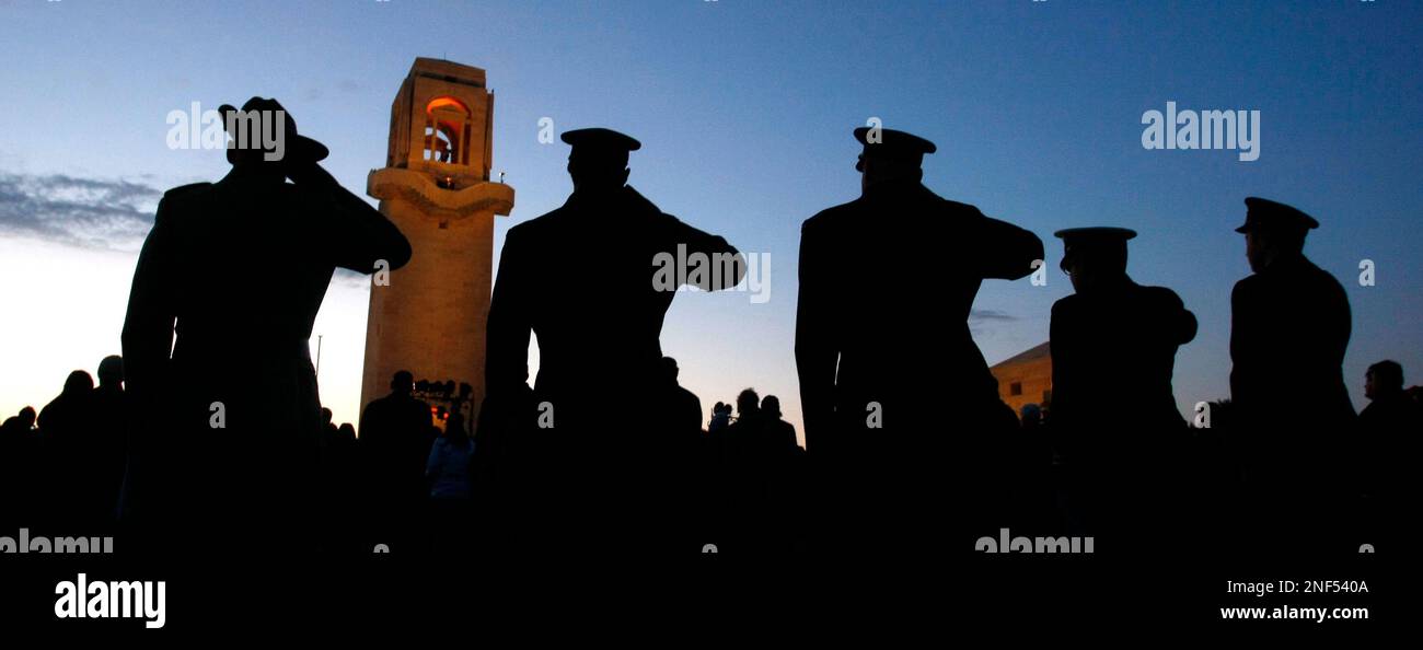 Australian soldiers salute during the wreath laying ceremonies at the ...