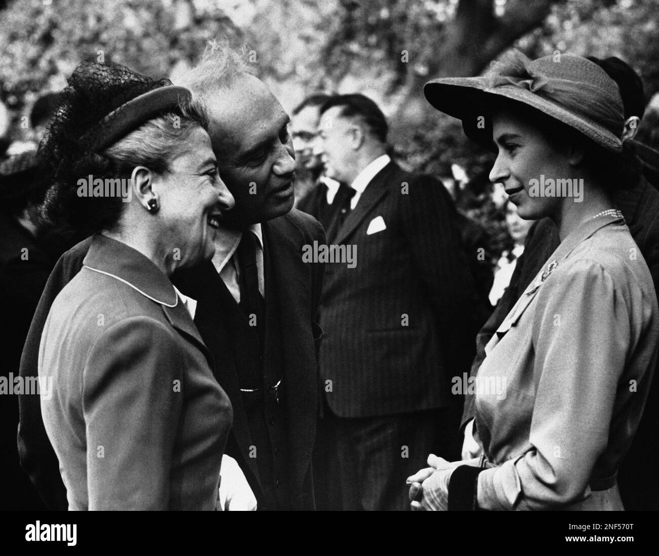Princess Elizabeth (right) greets Mr. and Mrs. Sam Taylor, of Los ...