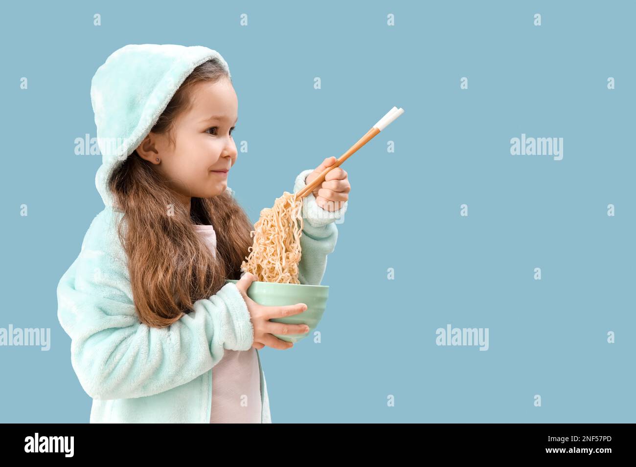 Little chinese girl eating chopsticks hi-res stock photography and ...