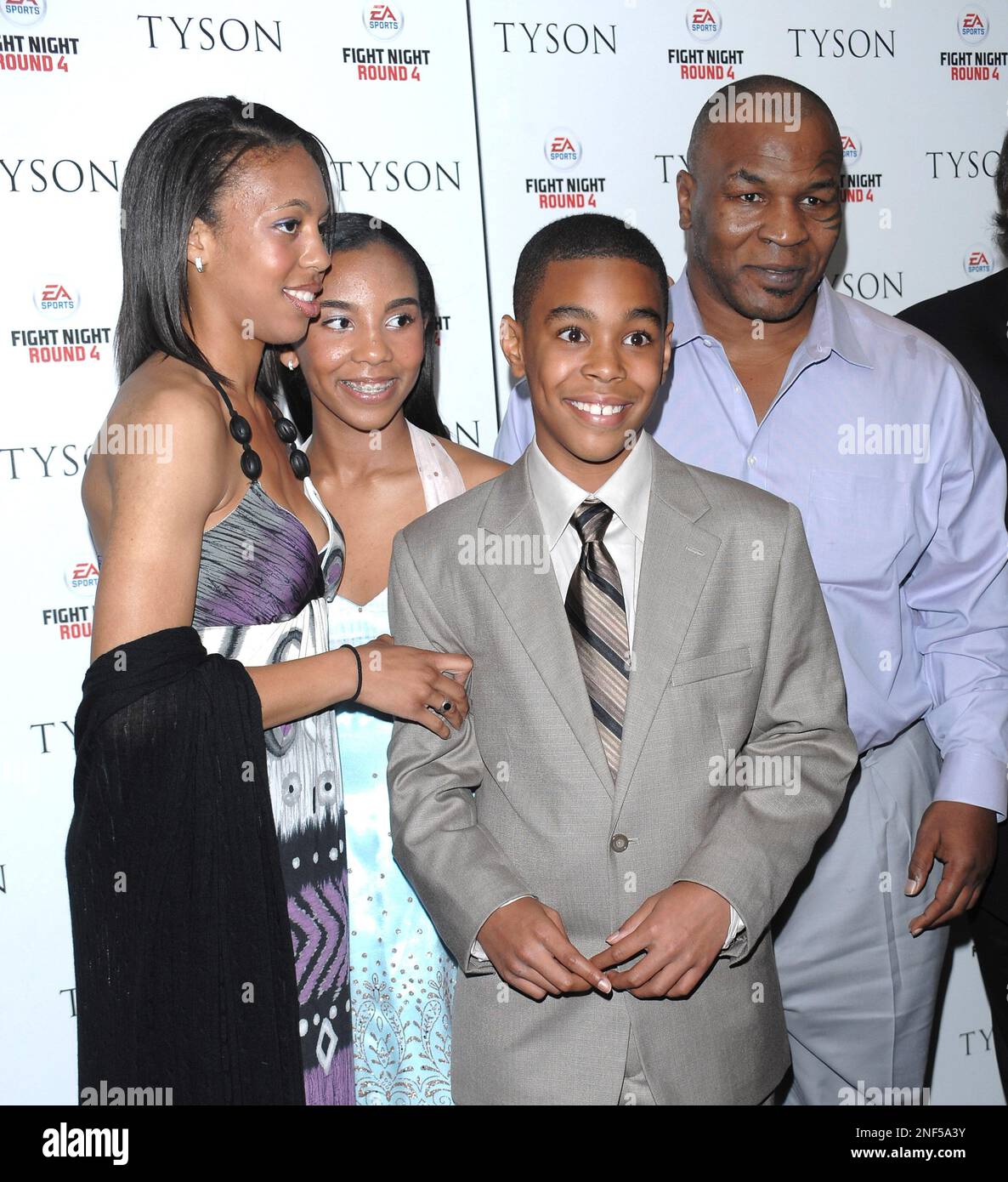 Former heavyweight boxing champion Mike Tyson poses with his children ...