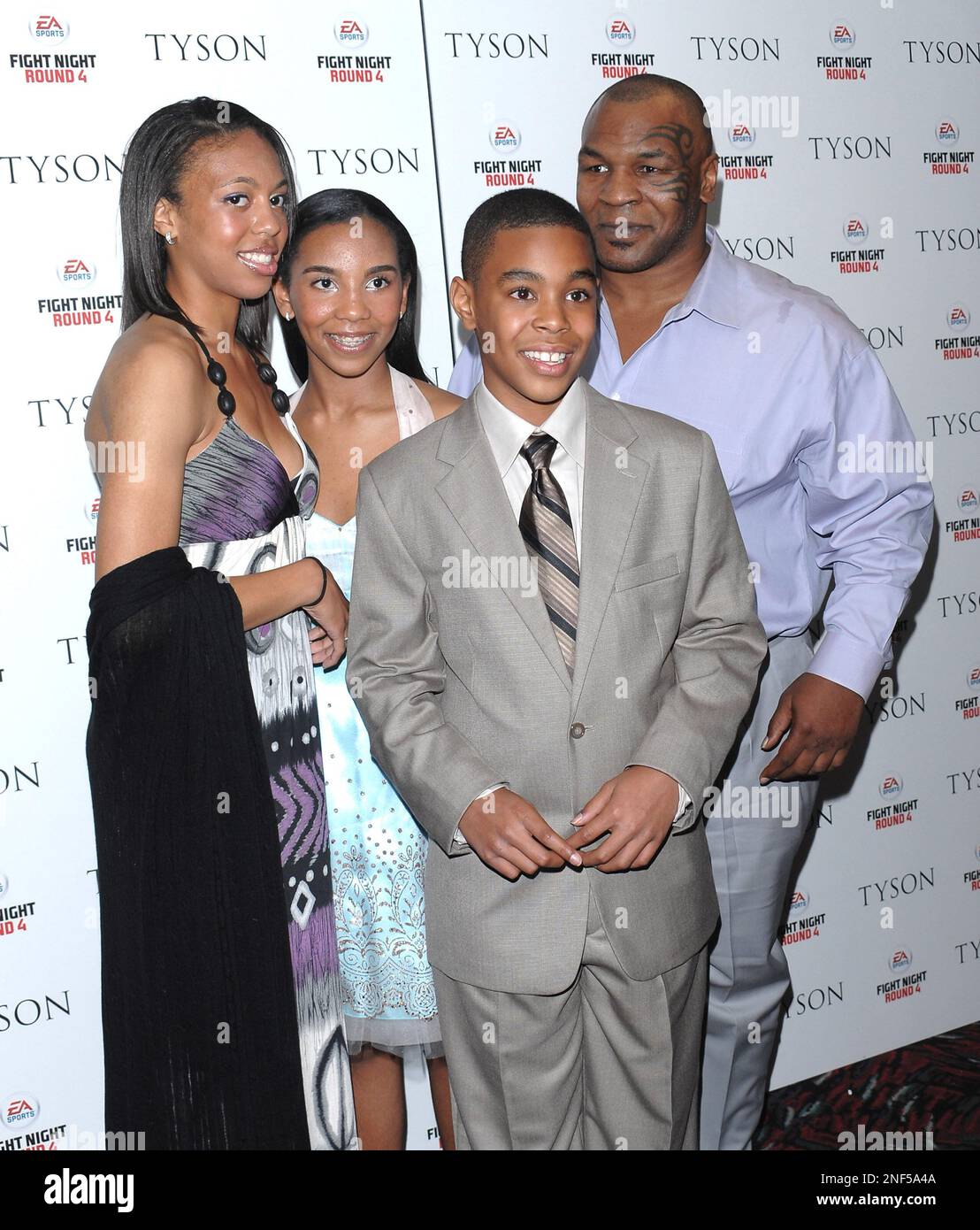 Former heavyweight boxing champion Mike Tyson poses with his children ...