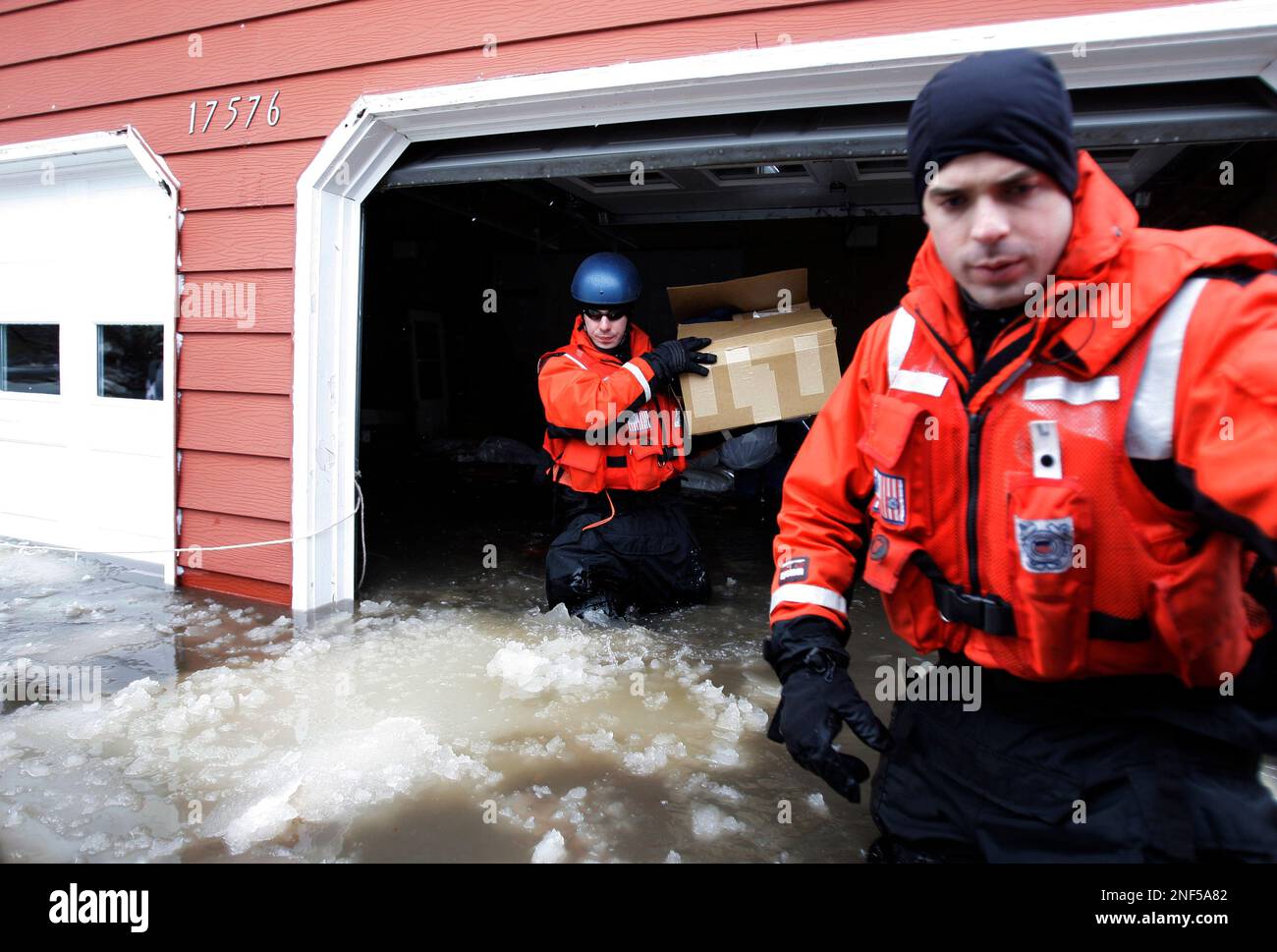 Danny McDormand of the U.S. Coast Guard, right, and Dan Fraley of the U ...