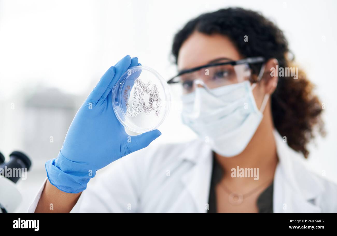 I know just what to do. a scientist conducting an experiment in a ...