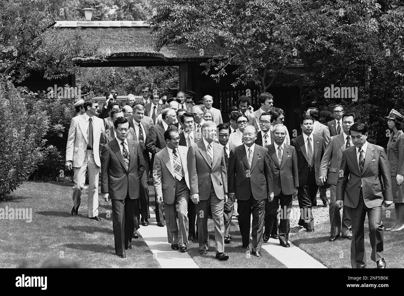 President Jimmy Carter and Prime Minister Masayoshi Ohira lead the way ...