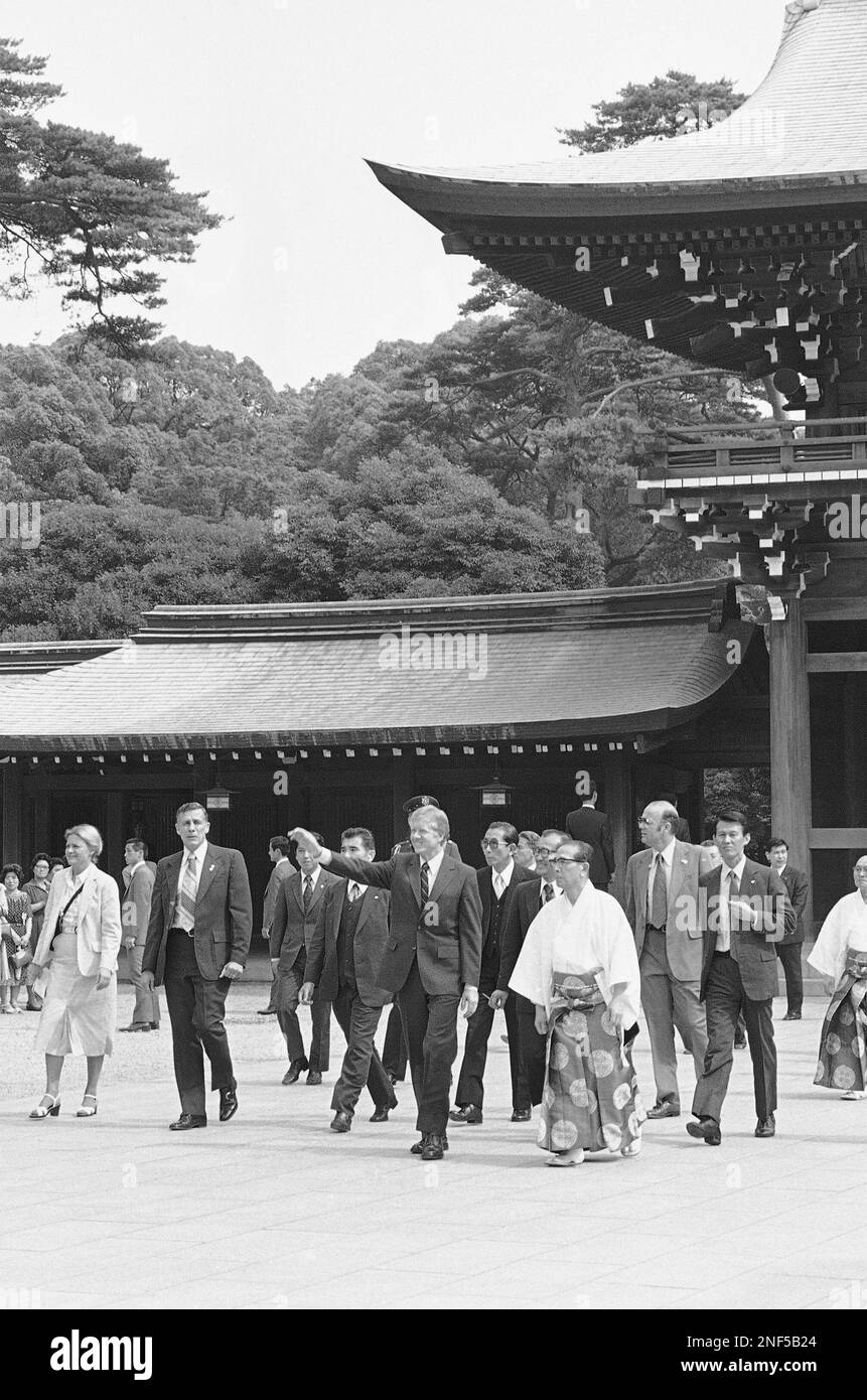 President Jimmy Carter is escorted by Shinichiro Takada, High Shinto ...