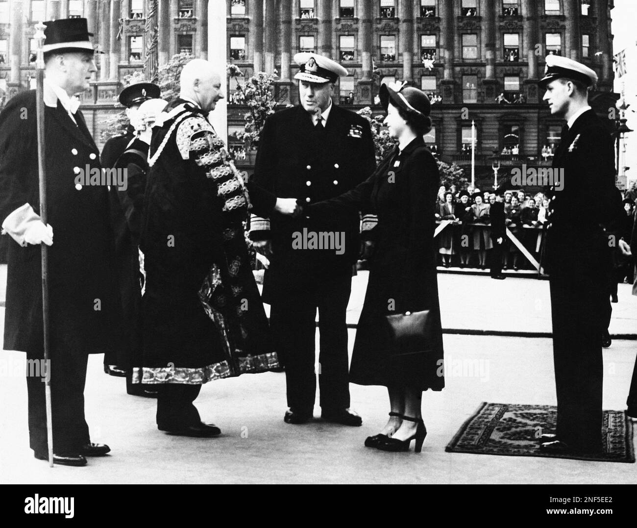 Princess Elizabeth, center, and the Duke of Edinburgh, right, are ...