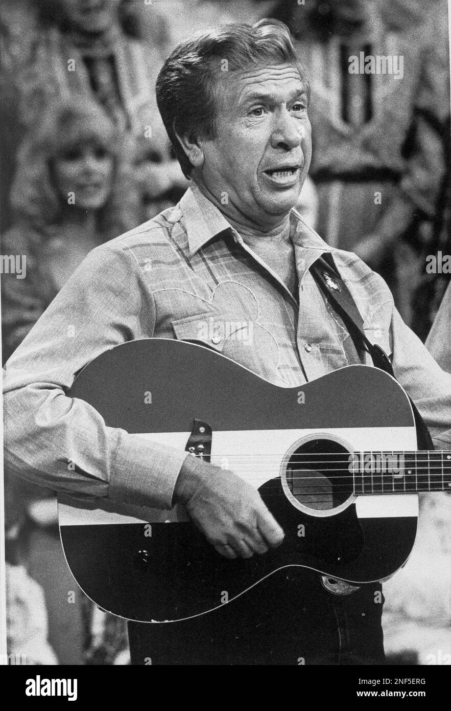 Buck Owens, the grinning co-host of the 16-year-old television show "Hee Haw," describes the ...