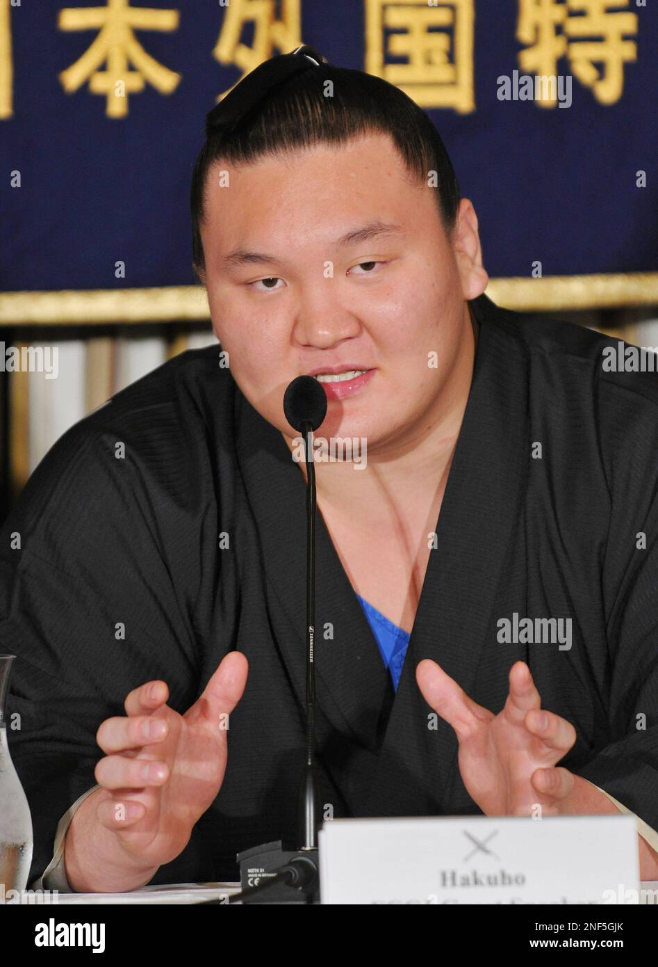 Japan's sumo grand champion Hakuho speaks during a press conference at ...