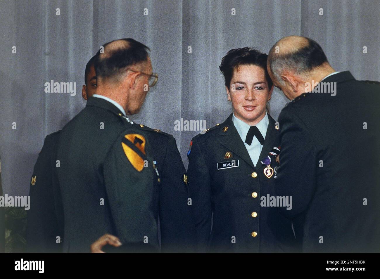 Specialist Melissa Rathbun-Nealy, 21, receives three medals on ...