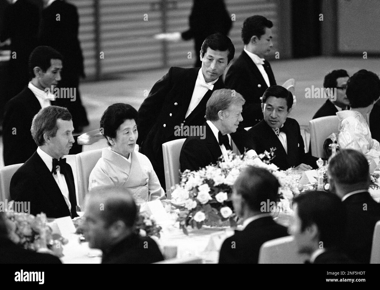 U.S. President Jimmy Carter talks with Japanese Crown Prince Akihito ...