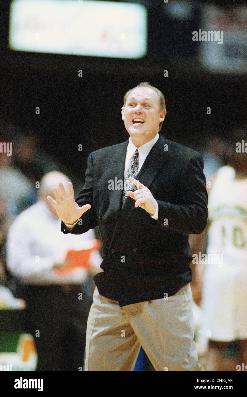 Seattle SuperSonics' head coach George Karl walks up the floor to make ...