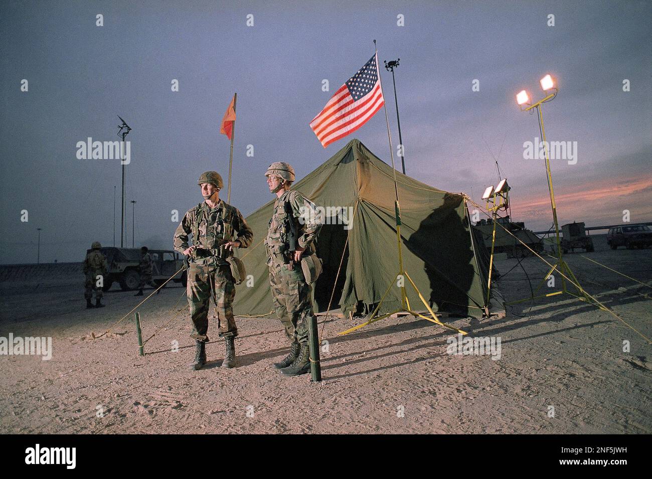 With an American flag flying in Iraqi Territory, U.S. Army Major Bernie ...