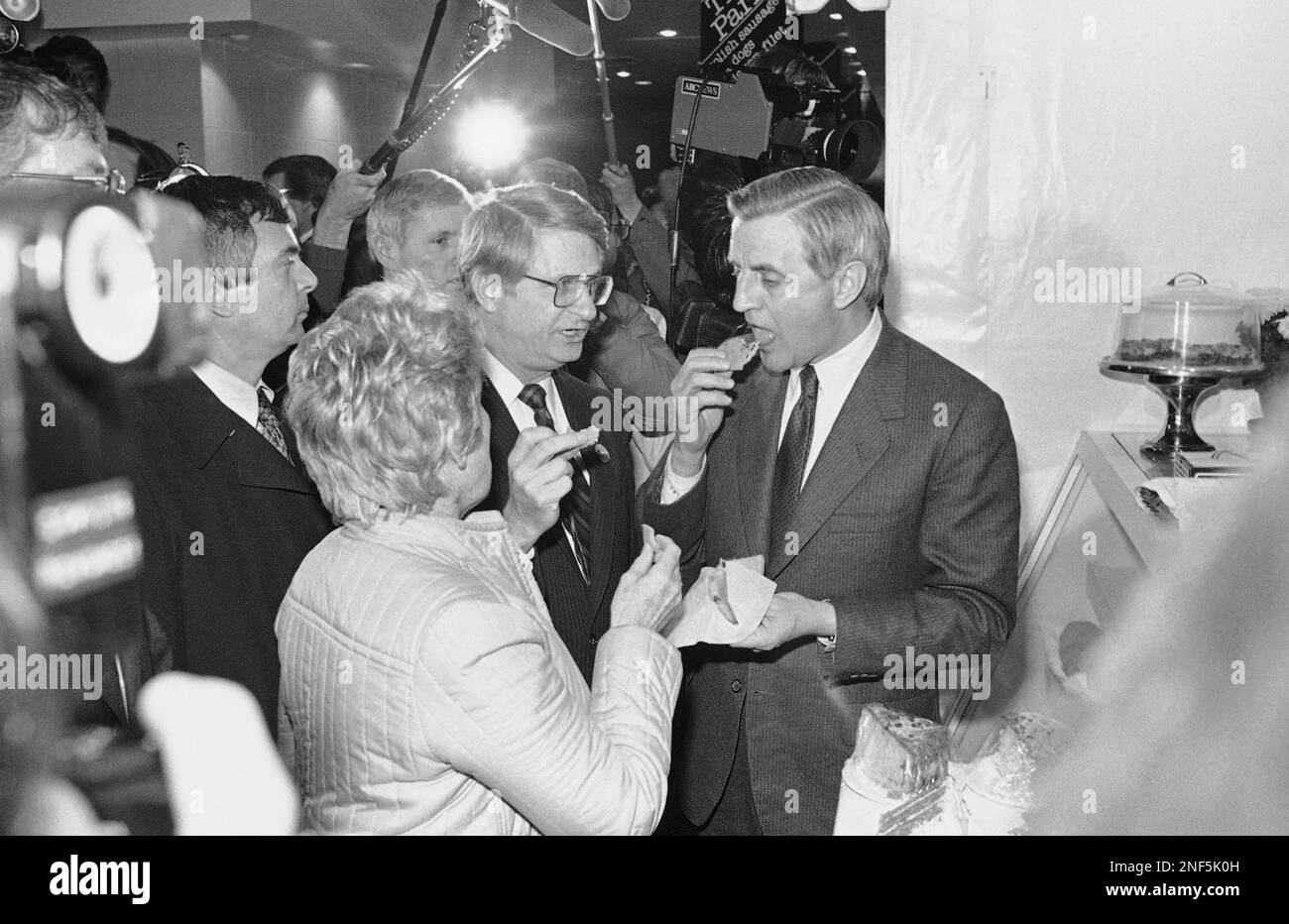 Presidential candidate Walter Mondale, center, samples cookie at a ...
