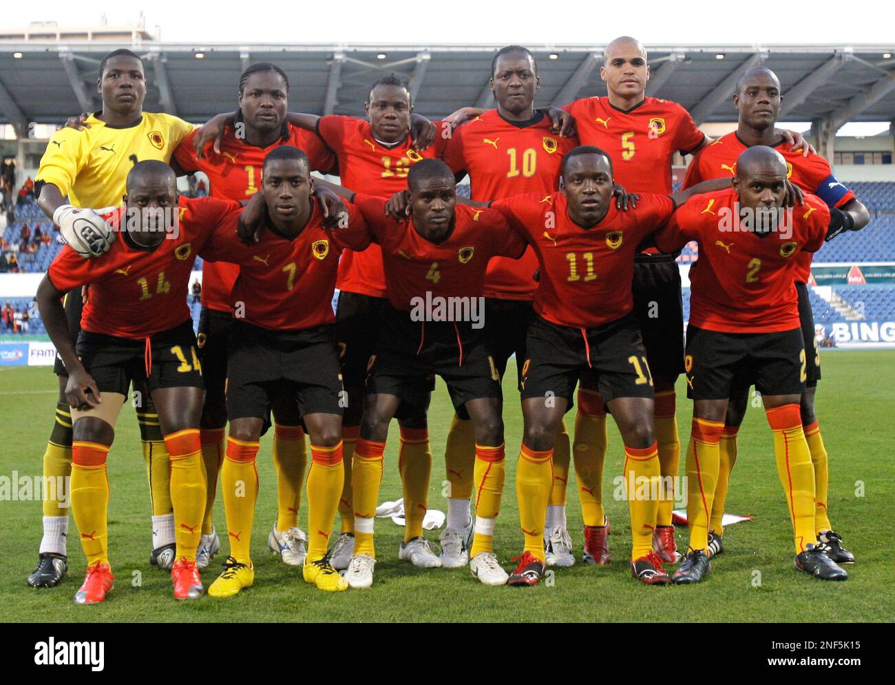 Angola players pose for a photograph before their friendly soccer match ...