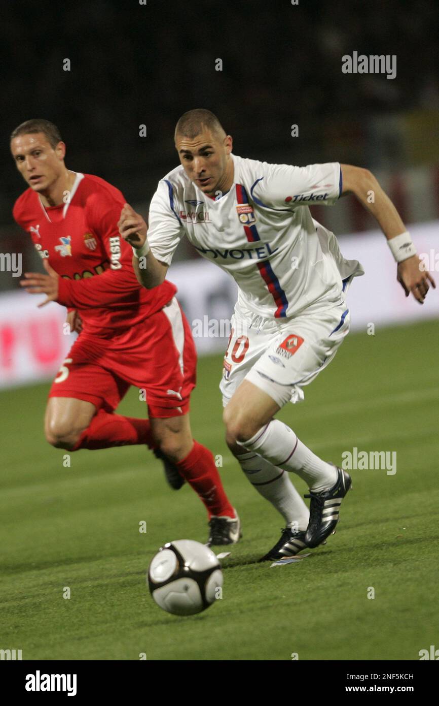Lyon's Karim Benzema, right, challenges for the ball with Monaco's ...