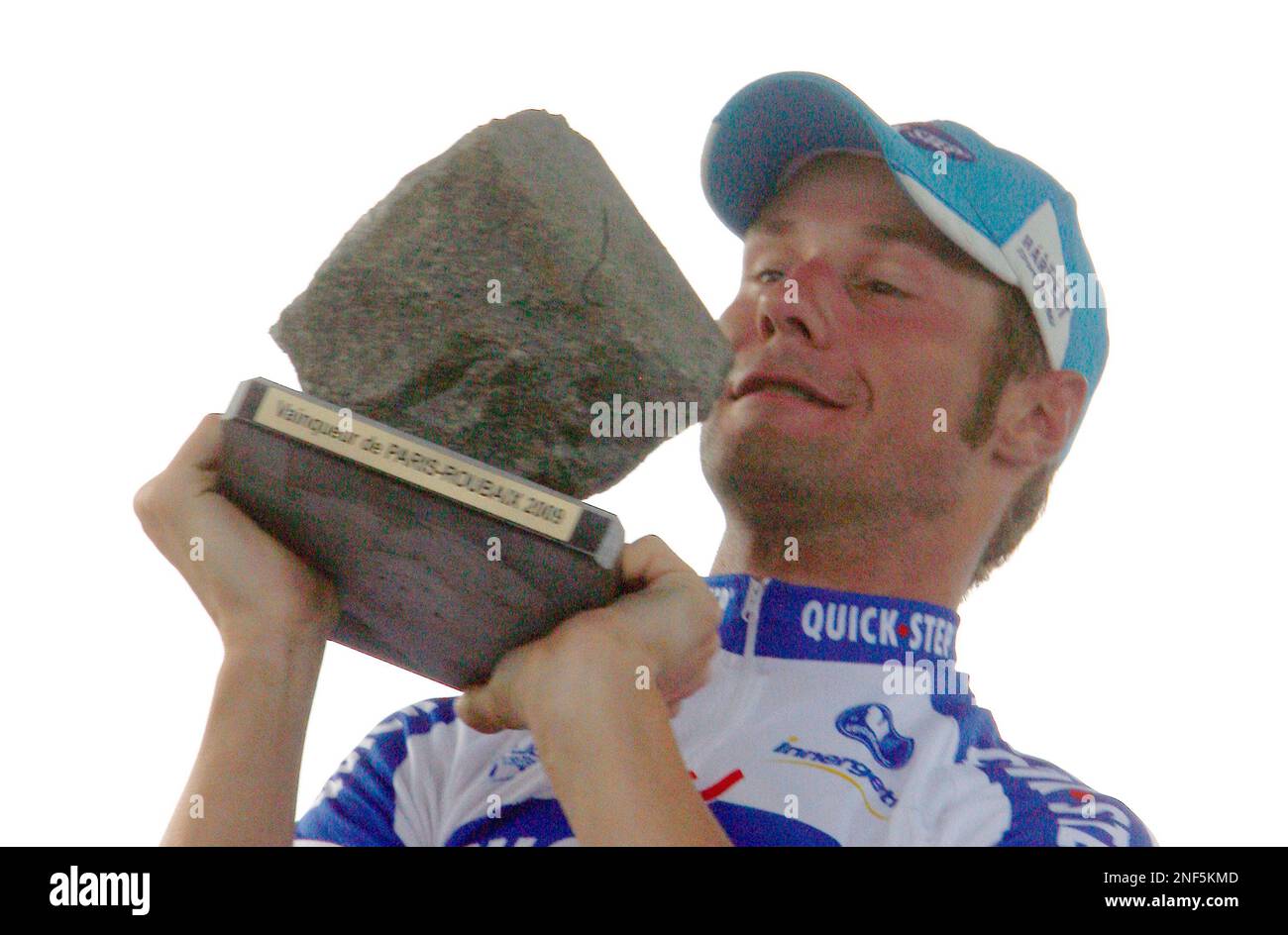 Belgium's Tom Boonen poses on the winner's podium of the Paris Roubaix ...