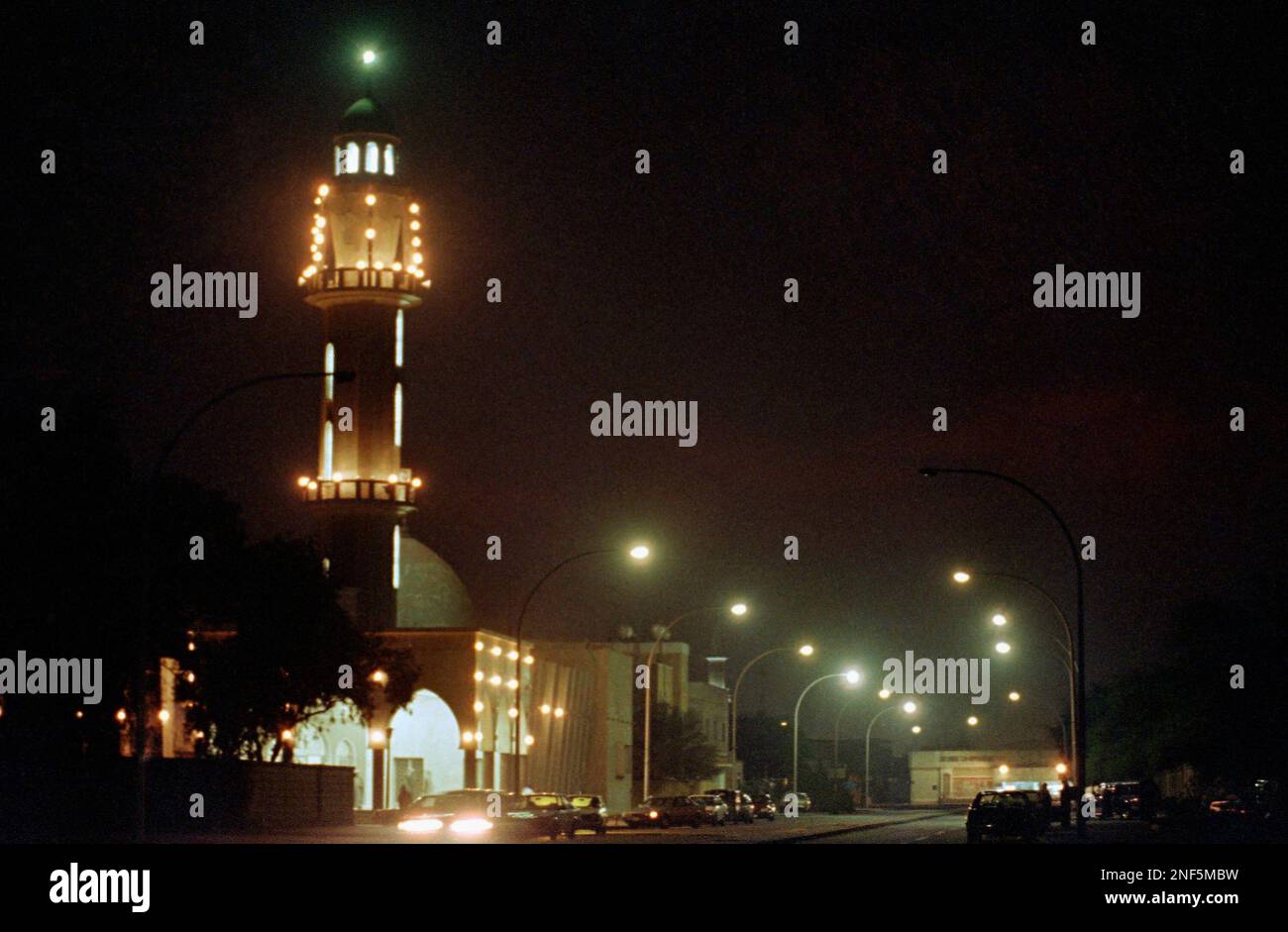 Lights illuminate Al-Naky Mosque and street lights shine on the st in ...